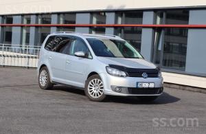Grey Volkswagen Touran 2011 in Riga, with an engine capacity of 2.00 L and mileage of 408 thousand km for 3980 €, photo 1 on AUTOMOTO.COM.LV