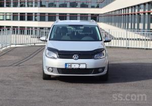 Grey Volkswagen Touran 2011 in Riga, with an engine capacity of 2.00 L and mileage of 408 thousand km for 3980 €, photo 3 on AUTOMOTO.COM.LV