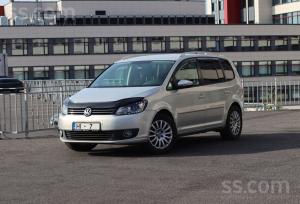 Grey Volkswagen Touran 2011 in Riga, with an engine capacity of 2.00 L and mileage of 408 thousand km for 3980 €, photo 4 on AUTOMOTO.COM.LV