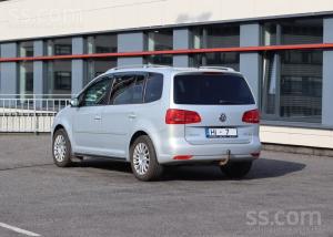 Grey Volkswagen Touran 2011 in Riga, with an engine capacity of 2.00 L and mileage of 408 thousand km for 3980 €, photo 5 on AUTOMOTO.COM.LV
