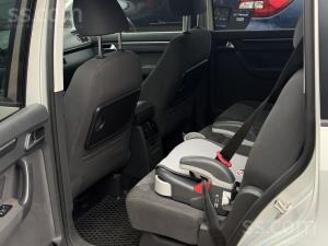 Grey Volkswagen Touran 2011 in Riga, with an engine capacity of 2.00 L and mileage of 408 thousand km for 3980 €, photo 11 on AUTOMOTO.COM.LV