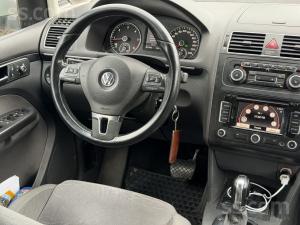Grey Volkswagen Touran 2011 in Riga, with an engine capacity of 2.00 L and mileage of 408 thousand km for 3980 €, photo 13 on AUTOMOTO.COM.LV