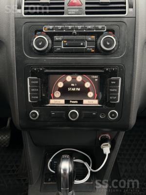 Grey Volkswagen Touran 2011 in Riga, with an engine capacity of 2.00 L and mileage of 408 thousand km for 3980 €, photo 14 on AUTOMOTO.COM.LV