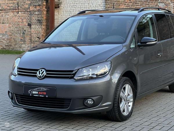 Grey Volkswagen Touran 2012 in Kedainiai, with an engine capacity of 1.39 L and mileage of 219 thousand km for 5950 €, photo 11 on AUTOMOTO.COM.LV