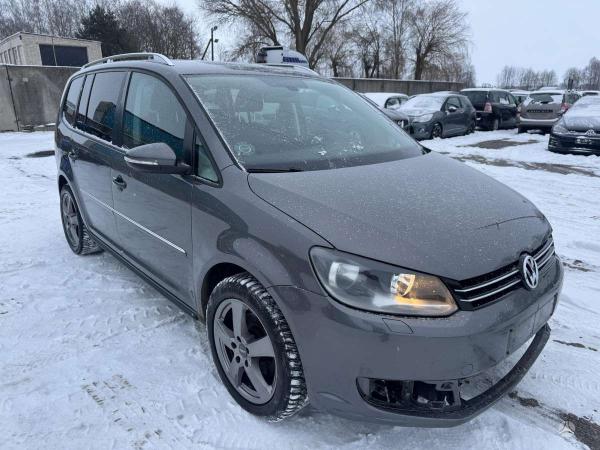 Grey Volkswagen Touran 2012 in Marijampole, with an engine capacity of 1.60 L and mileage of 250 thousand km for 3600 €, photo 1 on AUTOMOTO.COM.LV
