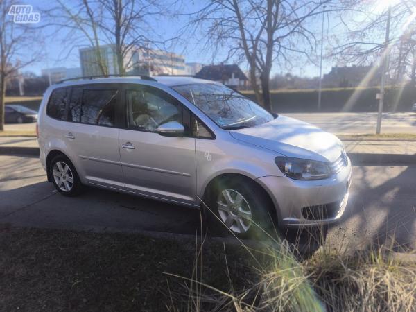 Grey Volkswagen Touran 2012 in Siauliai, with an engine capacity of 1.60 L and mileage of 290 thousand km for 4400 €, photo 4 on AUTOMOTO.COM.LV