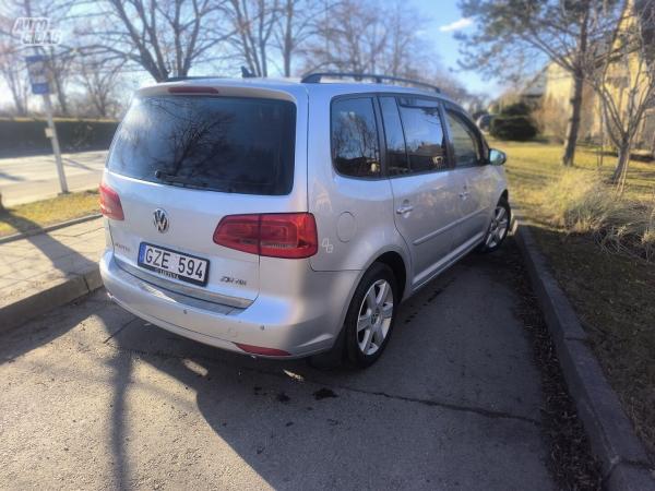 Grey Volkswagen Touran 2012 in Siauliai, with an engine capacity of 1.60 L and mileage of 290 thousand km for 4400 €, photo 6 on AUTOMOTO.COM.LV