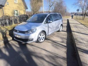 Grey Volkswagen Touran 2012 in Siauliai, with an engine capacity of 1.60 L and mileage of 290 thousand km for 4400 €, photo 12 on AUTOMOTO.COM.LV