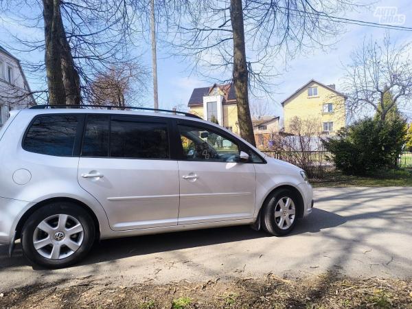 Grey Volkswagen Touran 2012 in Siauliai, with an engine capacity of 1.60 L and mileage of 290 thousand km for 4400 €, photo 3 on AUTOMOTO.COM.LV