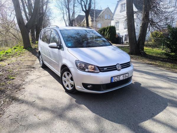 Grey Volkswagen Touran 2012 in Siauliai, with an engine capacity of 1.60 L and mileage of 290 thousand km for 4400 €, photo 7 on AUTOMOTO.COM.LV