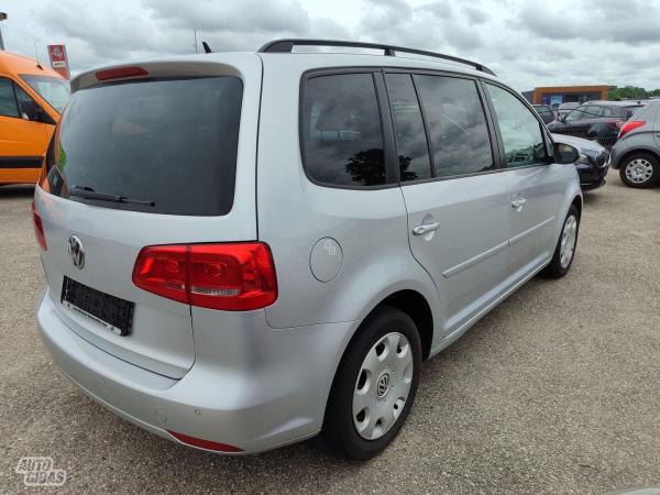 Grey Volkswagen Touran 2012 in Marijampole, with an engine capacity of 1.40 L and mileage of 195 thousand km for 4950 €, photo 4 on AUTOMOTO.COM.LV