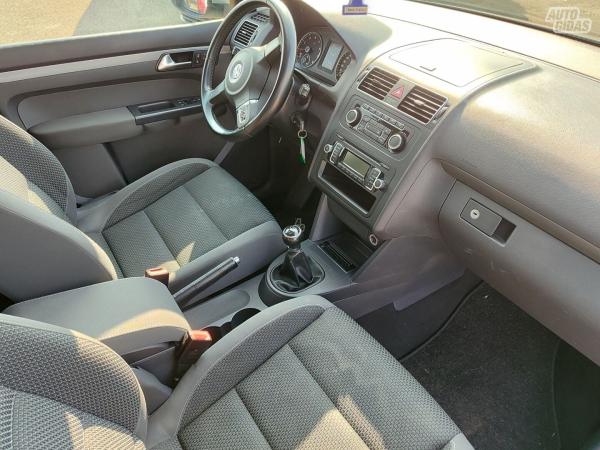Grey Volkswagen Touran 2012 in Marijampole, with an engine capacity of 1.40 L and mileage of 195 thousand km for 5250 €, photo 5 on AUTOMOTO.COM.LV