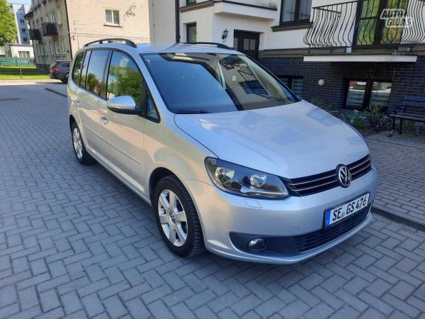 Grey Volkswagen Touran 2012 in Kretinga, with an engine capacity of 1.60 L and mileage of 205 thousand km for 6350 €, photo 2 on AUTOMOTO.COM.LV