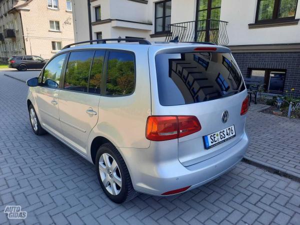 Grey Volkswagen Touran 2012 in Kretinga, with an engine capacity of 1.60 L and mileage of 205 thousand km for 6350 €, photo 6 on AUTOMOTO.COM.LV
