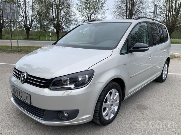 Grey Volkswagen Touran 2012 in Ogre, with an engine capacity of 1.60 L and mileage of 255 thousand km for 6470 €, photo 3 on AUTOMOTO.COM.LV