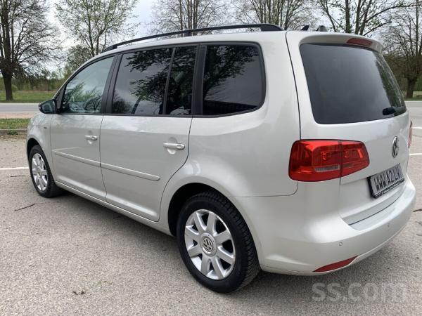 Grey Volkswagen Touran 2012 in Ogre, with an engine capacity of 1.60 L and mileage of 255 thousand km for 6470 €, photo 6 on AUTOMOTO.COM.LV