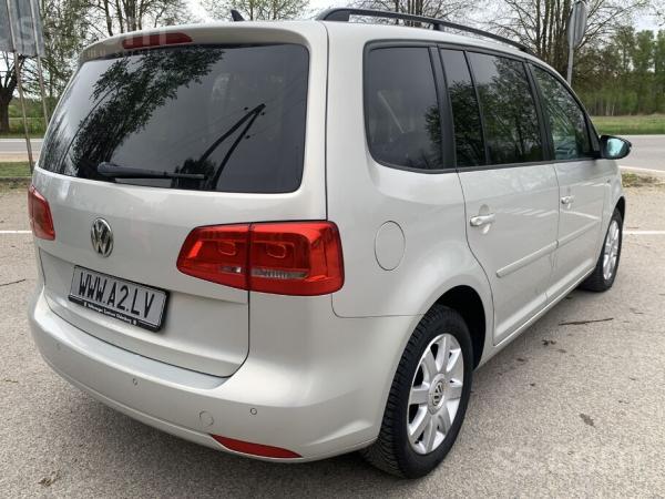 Grey Volkswagen Touran 2012 in Ogre, with an engine capacity of 1.60 L and mileage of 255 thousand km for 6470 €, photo 8 on AUTOMOTO.COM.LV
