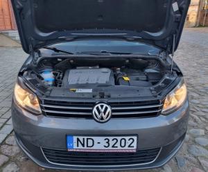 Grey Volkswagen Touran 2013 in Jelgava, with an engine capacity of 1.60 L and mileage of 334 thousand km for 6950 €, photo 25 on AUTOMOTO.COM.LV