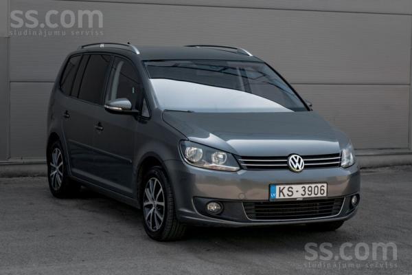 Grey Volkswagen Touran 2013 in Riga, with an engine capacity of 2.00 L and mileage of 0 thousand km for 5650 €, photo 3 on AUTOMOTO.COM.LV