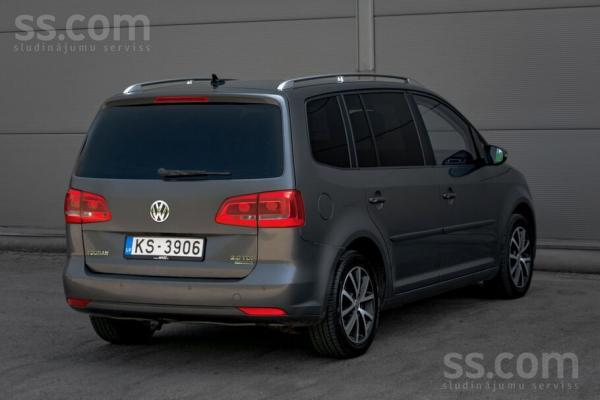 Grey Volkswagen Touran 2013 in Riga, with an engine capacity of 2.00 L and mileage of 0 thousand km for 5650 €, photo 4 on AUTOMOTO.COM.LV