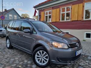 Pelēks Volkswagen Touran 2013 Jelgava, ar dzinēja tilpumu 1.60 L un nobraukumu 334 tūkst. km par 6950 €, foto 2 vietnē AUTOMOTO.COM.LV