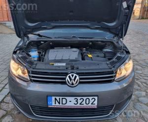 Pelēks Volkswagen Touran 2013 Jelgava, ar dzinēja tilpumu 1.60 L un nobraukumu 334 tūkst. km par 6950 €, foto 35 vietnē AUTOMOTO.COM.LV