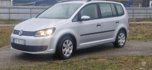 Grey Volkswagen Touran 2013 in Kelme, with an engine capacity of 1.60 L and mileage of 328 thousand km for 5350 €, photo 2 on AUTOMOTO.COM.LV