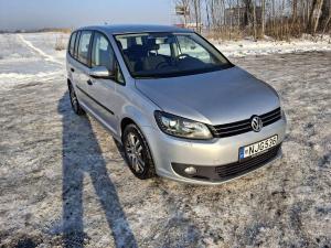 Grey Volkswagen Touran 2013 in Kaunas, with an engine capacity of 1.60 L and mileage of 237 thousand km for 6090 €, photo 5 on AUTOMOTO.COM.LV