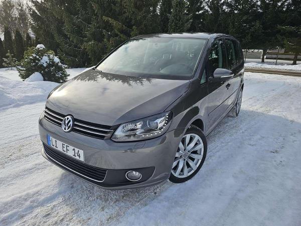 Grey Volkswagen Touran 2013 in Kaunas, with an engine capacity of 1.60 L and mileage of 150 thousand km for 6550 €, photo 2 on AUTOMOTO.COM.LV