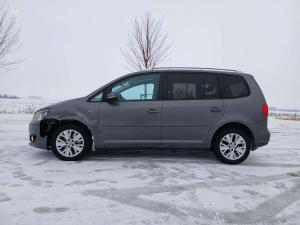 Grey Volkswagen Touran 2013 in Marijampole, with an engine capacity of 1.39 L and mileage of 156 thousand km for 4350 €, photo 4 on AUTOMOTO.COM.LV