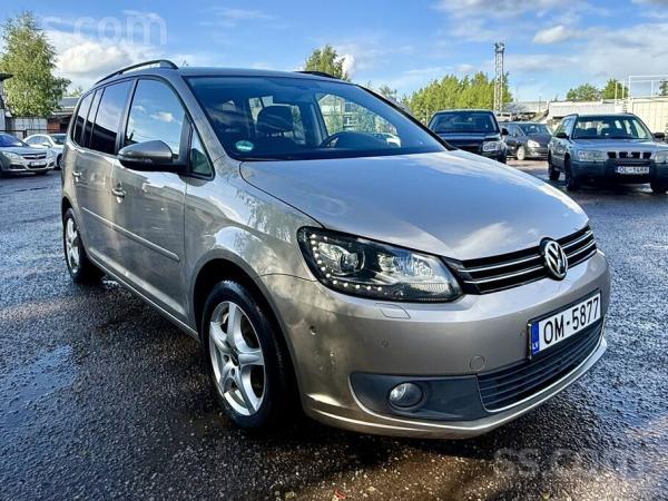 Pelēks Volkswagen Touran 2013 Rīga, ar dzinēja tilpumu 1.60 L un nobraukumu 0 tūkst. km par 5490 €, foto 1 vietnē AUTOMOTO.COM.LV