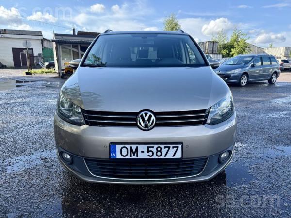 Pelēks Volkswagen Touran 2013 Rīga, ar dzinēja tilpumu 1.60 L un nobraukumu 0 tūkst. km par 5490 €, foto 3 vietnē AUTOMOTO.COM.LV