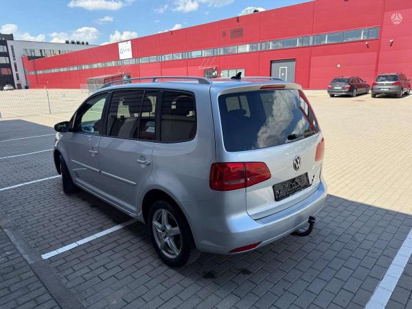 Grey Volkswagen Touran 2013 in Kaunas, with an engine capacity of 1.60 L and mileage of 250 thousand km for 6200 €, photo 4 on AUTOMOTO.COM.LV