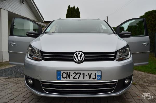 Grey Volkswagen Touran 2013 in Kaunas, with an engine capacity of 2.00 L and mileage of 230 thousand km for 6650 €, photo 5 on AUTOMOTO.COM.LV