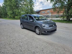 Grey Volkswagen Touran 2013 in Ukmerge, with an engine capacity of 1.60 L and mileage of 240 thousand km for 4150 €, photo 4 on AUTOMOTO.COM.LV
