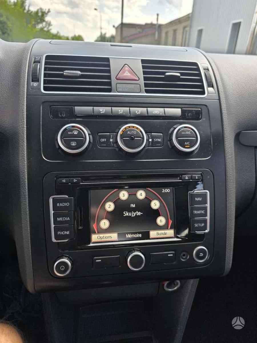 Grey Volkswagen Touran 2013 in Ukmerge, with an engine capacity of 1.60 L and mileage of 240 thousand km for 4150 €, photo 12 on AUTOMOTO.COM.LV