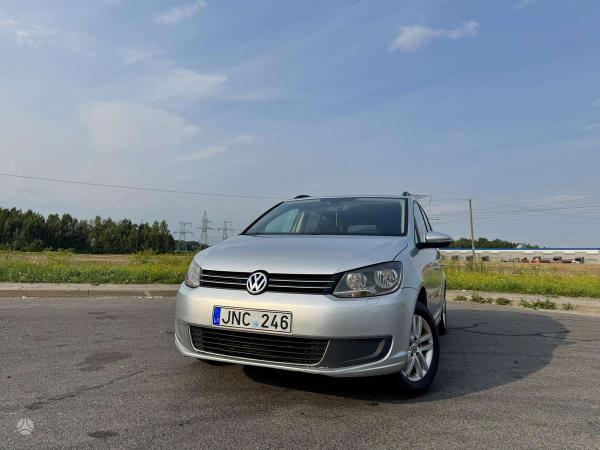 Grey Volkswagen Touran 2013 in Panevezys, with an engine capacity of 1.39 L and mileage of 358 thousand km for 1499 €, photo 1 on AUTOMOTO.COM.LV
