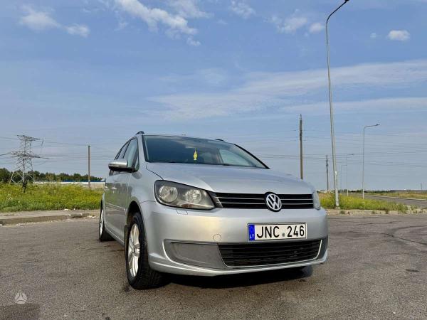 Grey Volkswagen Touran 2013 in Panevezys, with an engine capacity of 1.39 L and mileage of 358 thousand km for 1499 €, photo 3 on AUTOMOTO.COM.LV