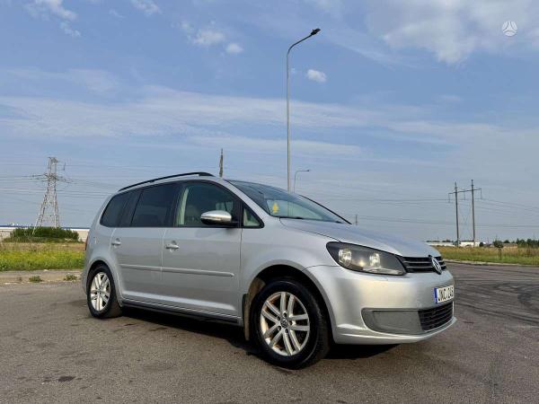 Grey Volkswagen Touran 2013 in Panevezys, with an engine capacity of 1.39 L and mileage of 358 thousand km for 1499 €, photo 4 on AUTOMOTO.COM.LV