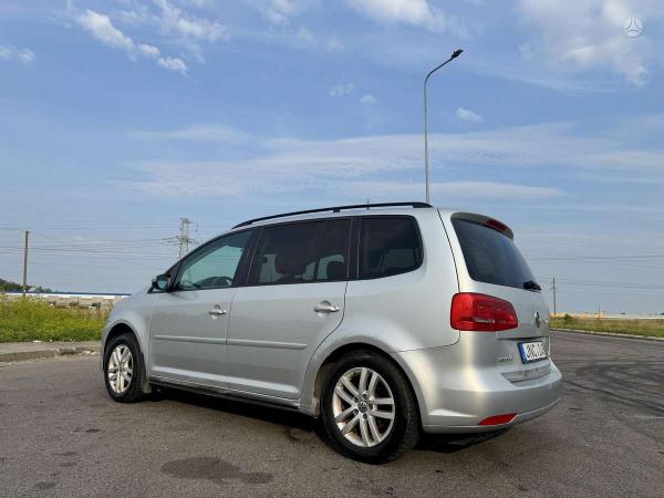 Grey Volkswagen Touran 2013 in Panevezys, with an engine capacity of 1.39 L and mileage of 358 thousand km for 1499 €, photo 8 on AUTOMOTO.COM.LV