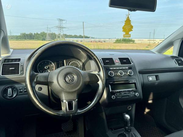 Grey Volkswagen Touran 2013 in Panevezys, with an engine capacity of 1.39 L and mileage of 358 thousand km for 1499 €, photo 9 on AUTOMOTO.COM.LV