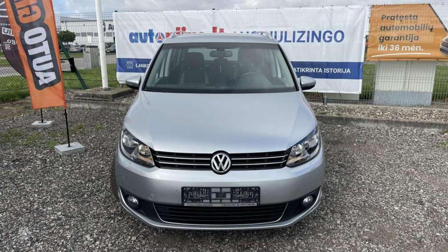 Grey Volkswagen Touran 2013 in Marijampole, with an engine capacity of 1.60 L and mileage of 137 thousand km for 8190 €, photo 14 on AUTOMOTO.COM.LV