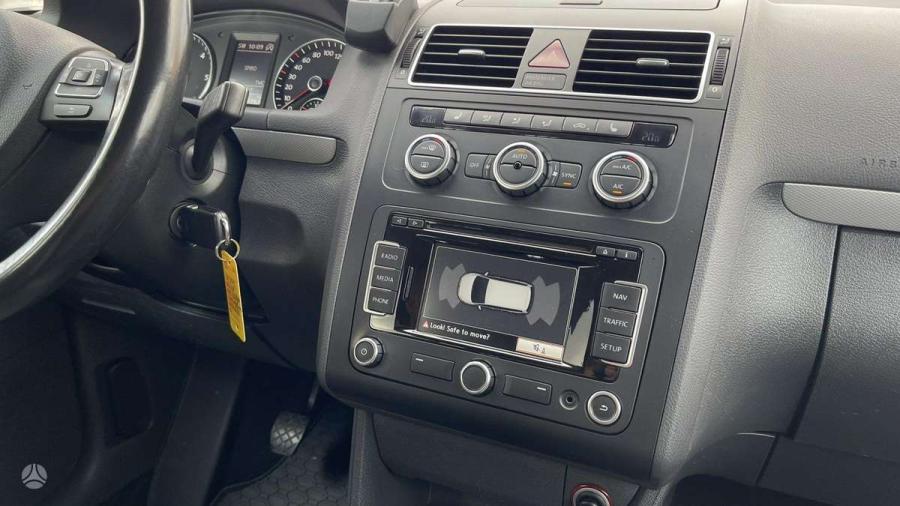 Grey Volkswagen Touran 2013 in Marijampole, with an engine capacity of 1.60 L and mileage of 137 thousand km for 8190 €, photo 31 on AUTOMOTO.COM.LV