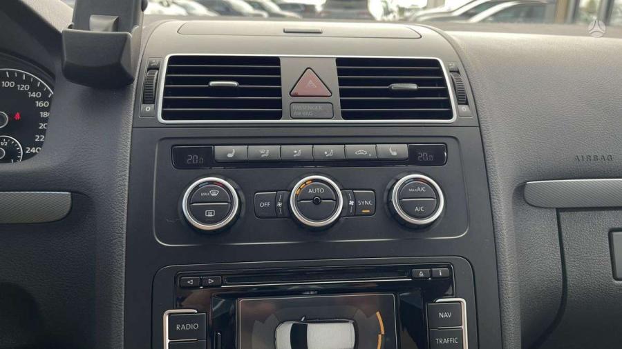 Grey Volkswagen Touran 2013 in Marijampole, with an engine capacity of 1.60 L and mileage of 137 thousand km for 8190 €, photo 35 on AUTOMOTO.COM.LV