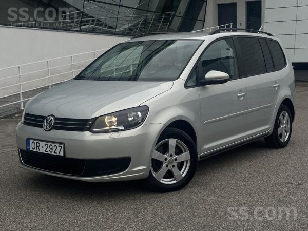 Grey Volkswagen Touran 2013 in Riga, with an engine capacity of 1.40 L and mileage of 219 thousand km for 5450 €, photo 1 on AUTOMOTO.COM.LV