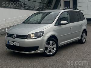 Grey Volkswagen Touran 2013 in Riga, with an engine capacity of 1.40 L and mileage of 219 thousand km for 5450 €, photo  on AUTOMOTO.COM.LV