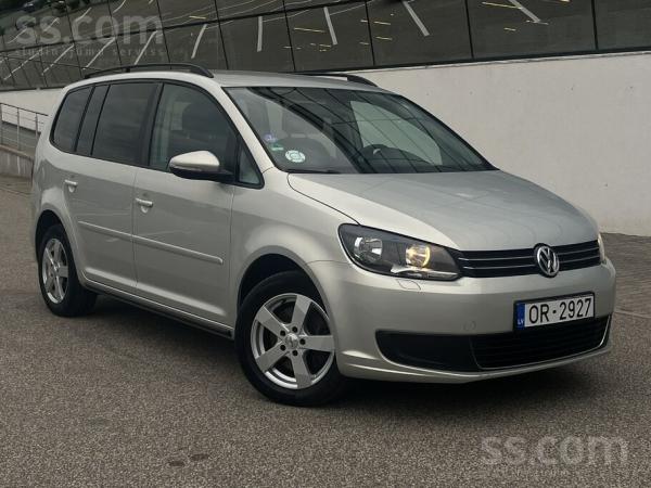 Grey Volkswagen Touran 2013 in Riga, with an engine capacity of 1.40 L and mileage of 219 thousand km for 5450 €, photo 3 on AUTOMOTO.COM.LV