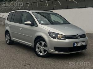 Grey Volkswagen Touran 2013 in Riga, with an engine capacity of 1.40 L and mileage of 219 thousand km for 5450 €, photo 4 on AUTOMOTO.COM.LV