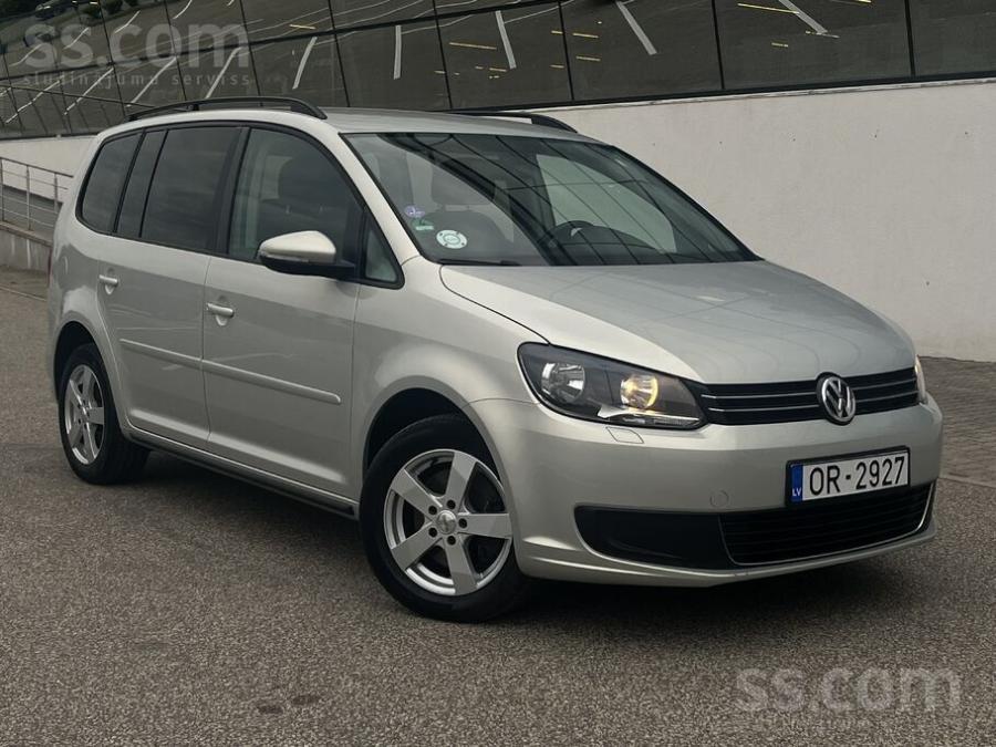 Grey Volkswagen Touran 2013 in Riga, with an engine capacity of 1.40 L and mileage of 219 thousand km for 5450 €, photo 4 on AUTOMOTO.COM.LV