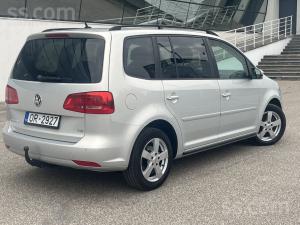 Grey Volkswagen Touran 2013 in Riga, with an engine capacity of 1.40 L and mileage of 219 thousand km for 5450 €, photo 5 on AUTOMOTO.COM.LV